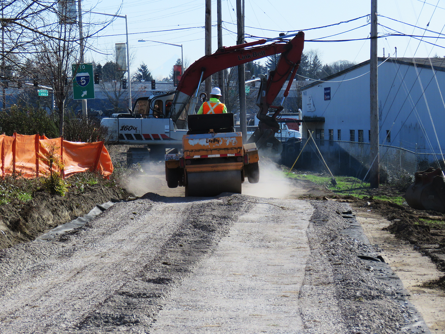 New section of multi-use path under construction along Lower River Road ...